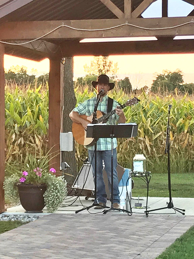 Live music against a backdrop of swaying corn creates the kind of authentic entertainment experience that no amount of stadium pyrotechnics could match.