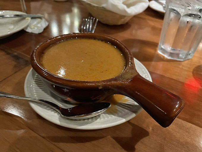 Lobster bisque served in a rustic crock&mdash;velvety, rich, and exactly what you want on a chilly Los Angeles evening.