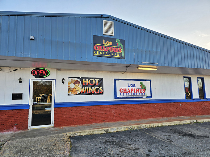 Los Chapines Restaurant's no-frills exterior belies the authentic flavors waiting inside, where hot wings and hearty meals satisfy locals and curious visitors alike.