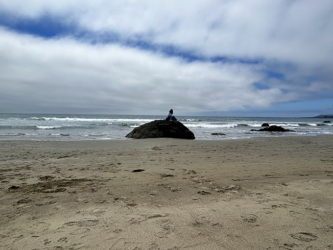 The beach offers solitude even in plain sight, where sitting on a rock becomes an impromptu meditation session with ocean soundtrack included.