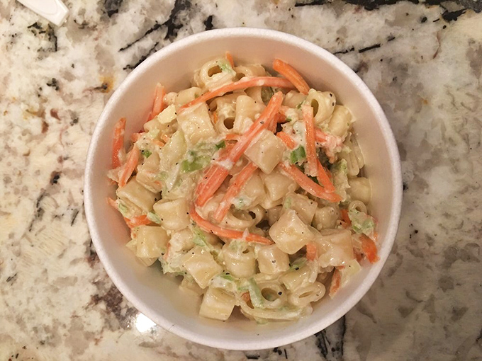 Mac salad that puts potluck versions to shame. Those little carrots and pops of green add color to a side dish that refuses to be overshadowed.