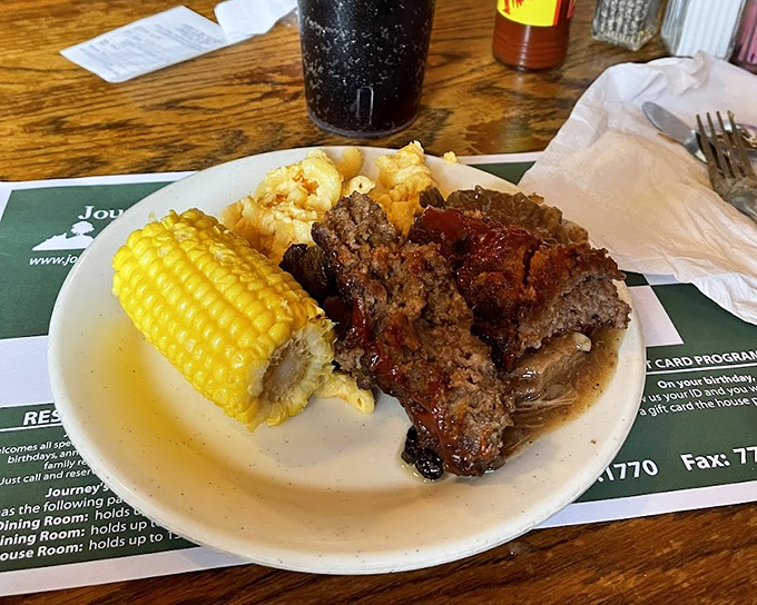Homestyle meatloaf with a glistening tomato glaze alongside buttery corn on the cob&mdash;comfort food that speaks directly to your childhood memories.