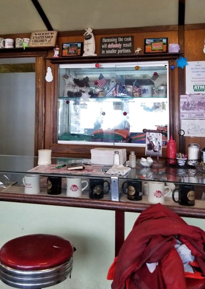 "Harassing the cook will definitely result in smaller portions." The sign says it all&mdash;diner humor that's been making customers smile since before Instagram existed.