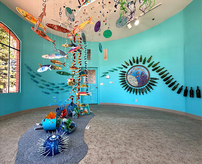 An underwater fantasy in turquoise &ndash; this installation transforms ordinary space into an extraordinary marine ecosystem of color and movement.