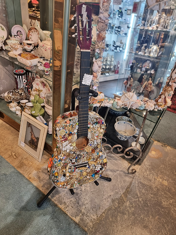 This bejeweled guitar doesn't just hang&mdash;it performs a silent symphony of sparkle, each rhinestone a note in its visual melody.