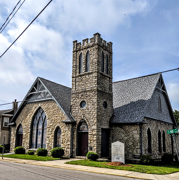 Mount Airy Friends Church blends stone craftsmanship with spiritual sanctuary in perfect architectural harmony.