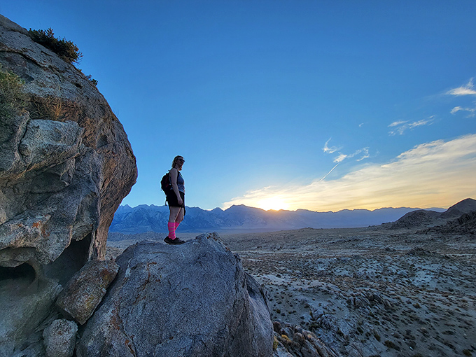 Sunset explorers discover that golden hour in the Alabama Hills turns ordinary humans into silhouetted heroes on nature's grand stage.