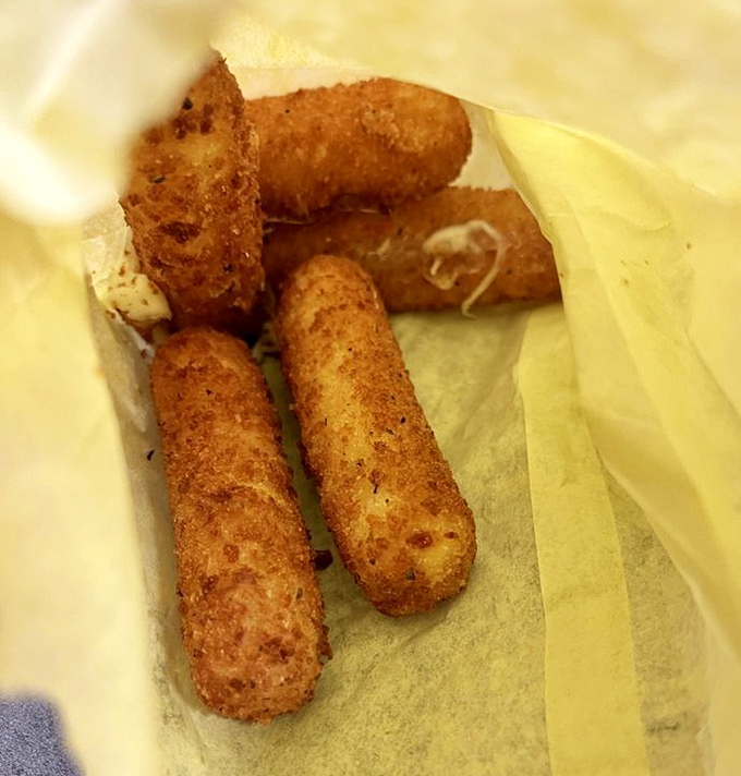 Mozzarella sticks: where the cheese pull is as important as the taste. These golden treasures make a strong case for appetizers as main courses.