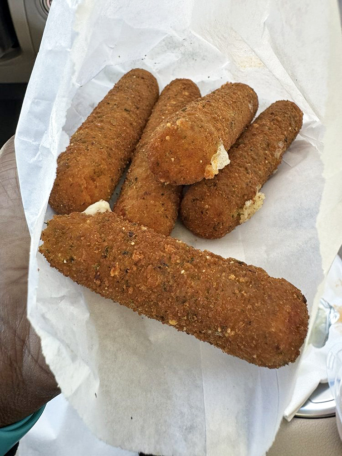 Mozzarella sticks with that perfect pull – the cheese stretches just enough to make you work for it, but not enough to become a physics experiment.