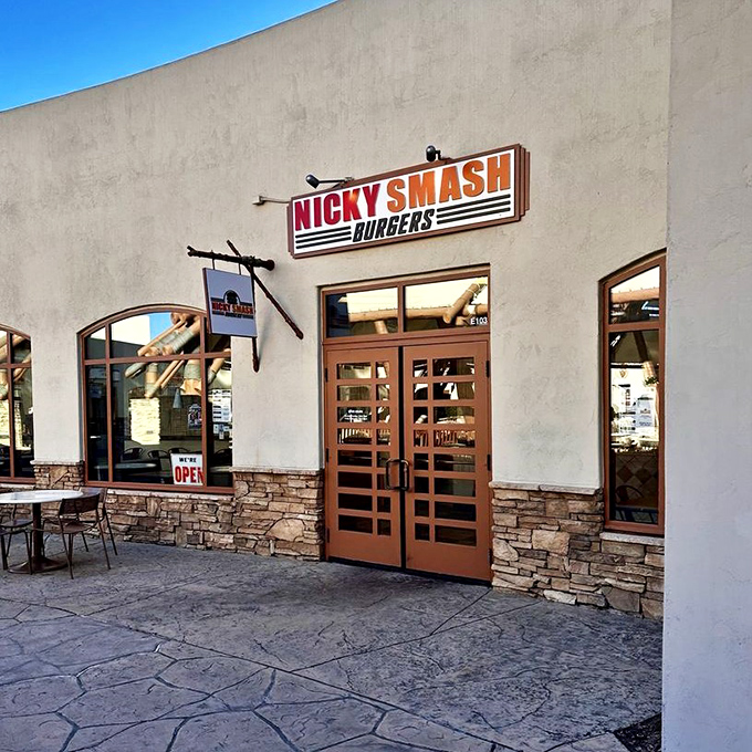 Nicky Smash Burgers promises hand-crafted indulgence when shopping fatigue hits. Their open doors practically waft burger perfume across the walkway.