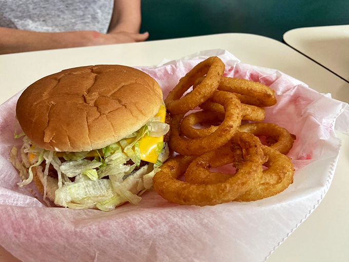 The burger and onion rings combo: a perfect marriage that's lasted longer than most Hollywood relationships.