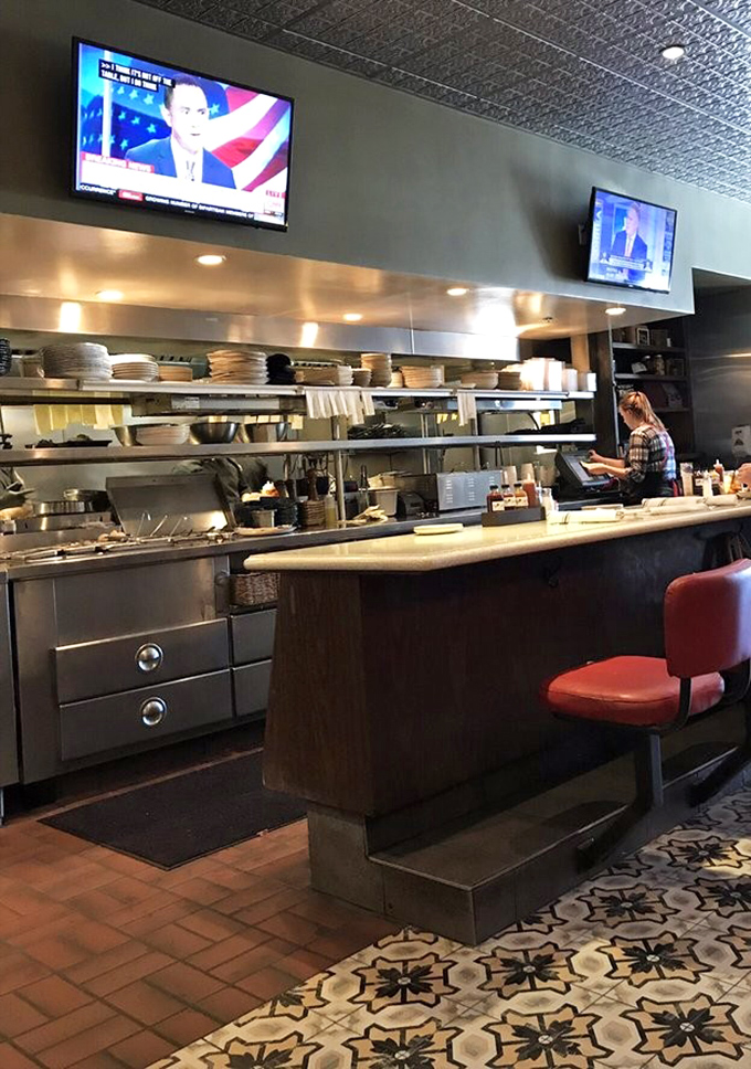 Where the magic happens &ndash; Gus's open kitchen lets you witness the choreography of smoke, fire, and skill that transforms ingredients into edible art.