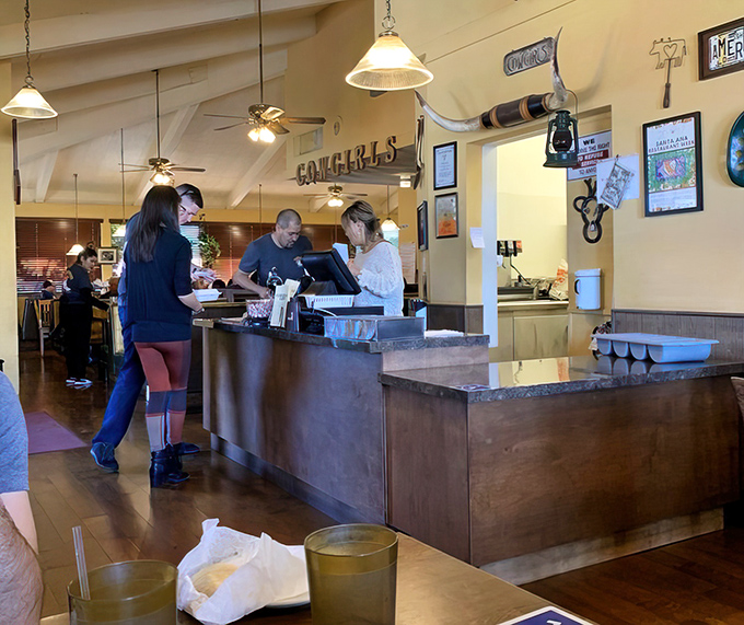 At the order counter, where breakfast dreams are processed and turned into platters of morning happiness.