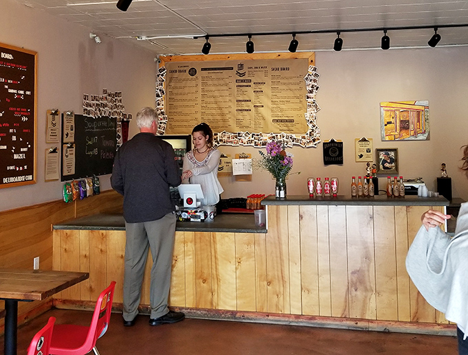 Behind the counter, the menu looms large while the ordering process flows with practiced precision and friendly efficiency.