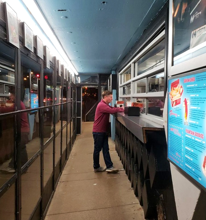 Late night at the order window feels like a scene from an American coming-of-age movie, where important life decisions revolve around toppings and shake flavors.