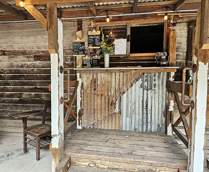This isn't just an order window&mdash;it's a portal to flavor town, framed by weathered wood and western charm.