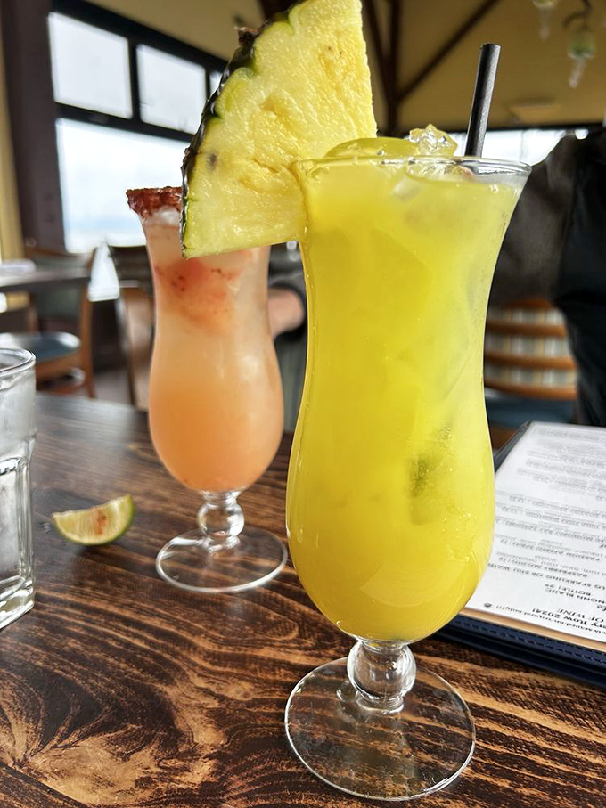 Tropical cocktails that transport you to island time, even as the Monterey fog rolls in. That pineapple garnish is basically a vacation passport.