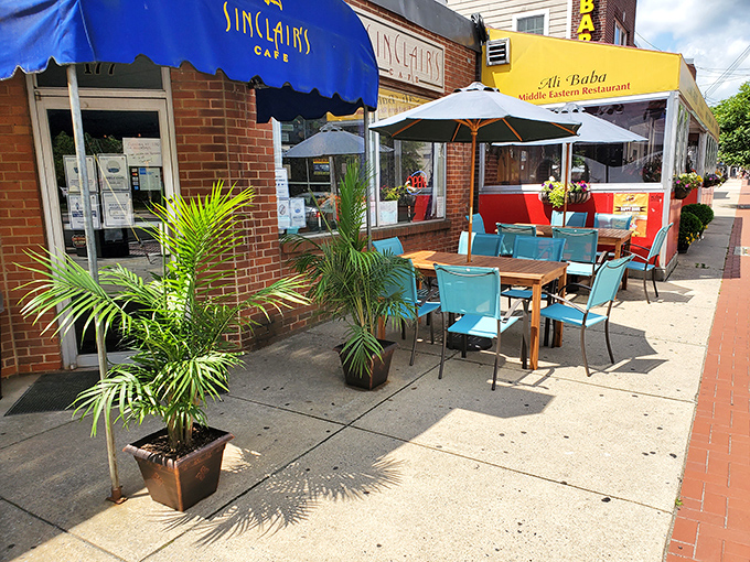 Summer dining al fresco&mdash;where potted palms and sidewalk seating transform a Newark morning into a mini vacation between bites.