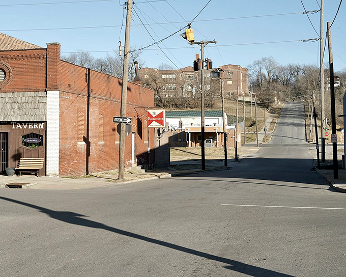 Penn Street's vintage storefronts and taverns hint at a time when cowboys, merchants, and outlaws might have crossed paths on these very bricks.