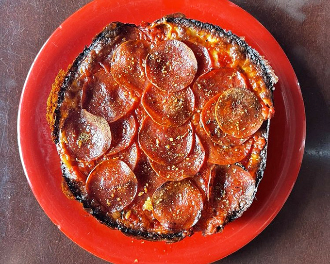 The personal pan pizza &ndash; for when you don't want to share perfection. That mushroom-topped beauty is a relationship worth committing to.