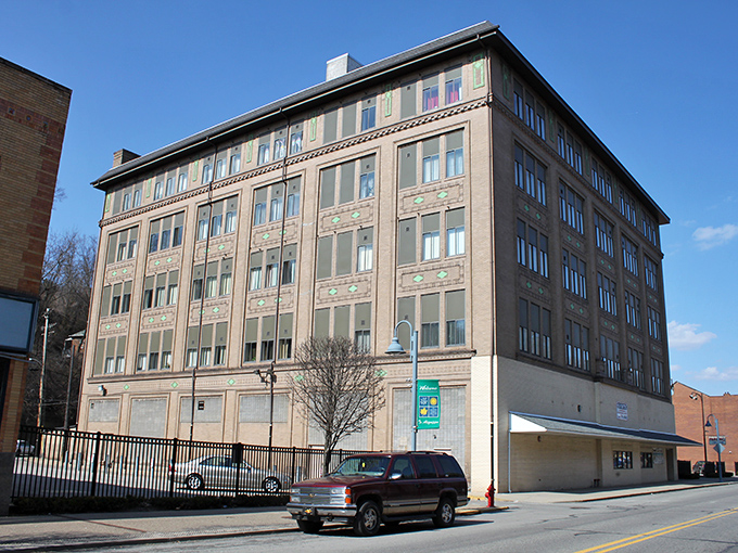 The Pittsburgh Mercantile Company building stands tall, a five-story reminder that Aliquippa once bustled with commercial energy and opportunity.
