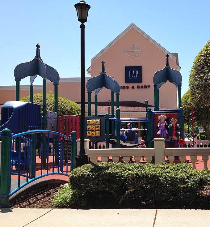 A playground for the kids when they've had enough of watching you try on seventeen nearly identical black tops.