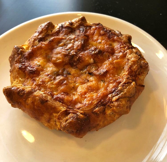 This savory galette doesn't just feed you; it hugs your soul with cheese and potatoes while whispering, "Diet? What diet?"