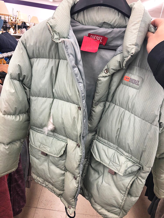 A Diesel puffer jacket hanging patiently for its next adventure. Yesterday's splurge becomes today's steal in the winter wear section.