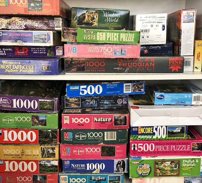 The puzzle section: where optimists and masochists alike can find their next 1,000-piece challenge for less than the price of a fancy coffee.