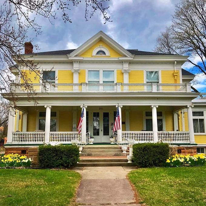 The Ringling House Bed & Breakfast glows with sunny yellow Victorian charm, offering a glimpse into the lifestyle of America's most famous circus family.