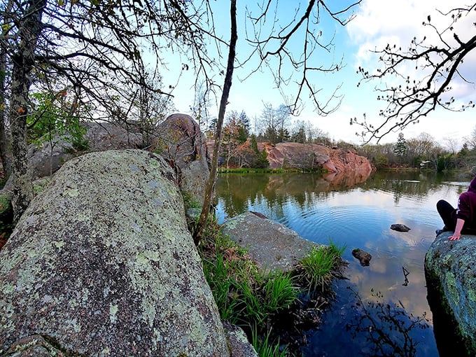 Reflections of eternity in a quarry pool. What was once an industrial site has transformed into a serene natural mirror. 