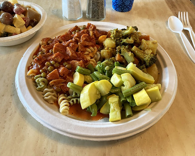 This isn't just a plate of pasta and vegetables&mdash;it's a colorful composition that proves vegetarian eating is anything but boring. The sauce looks like it means business.