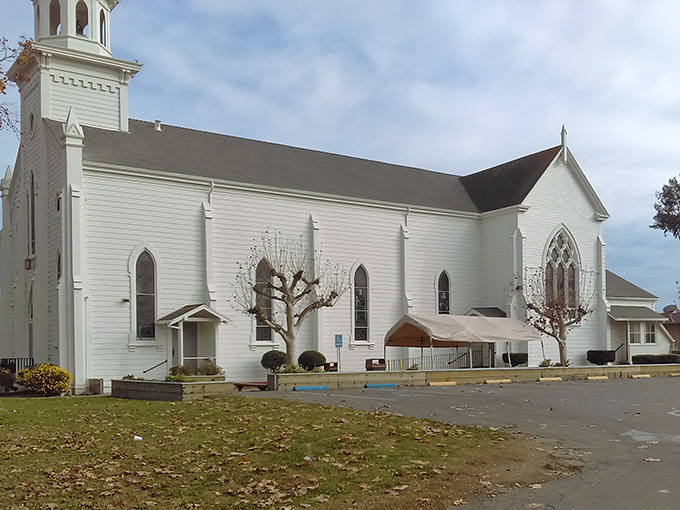 Sacred Heart Catholic Church's pristine white exterior has witnessed countless weddings, baptisms, and Sunday gatherings through Hollister's changing seasons.