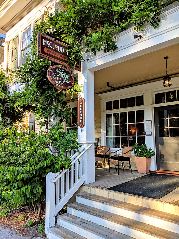 Sage Restaurant's vine-covered entrance promises the kind of meal worth driving mountain roads for, even in a rental car.