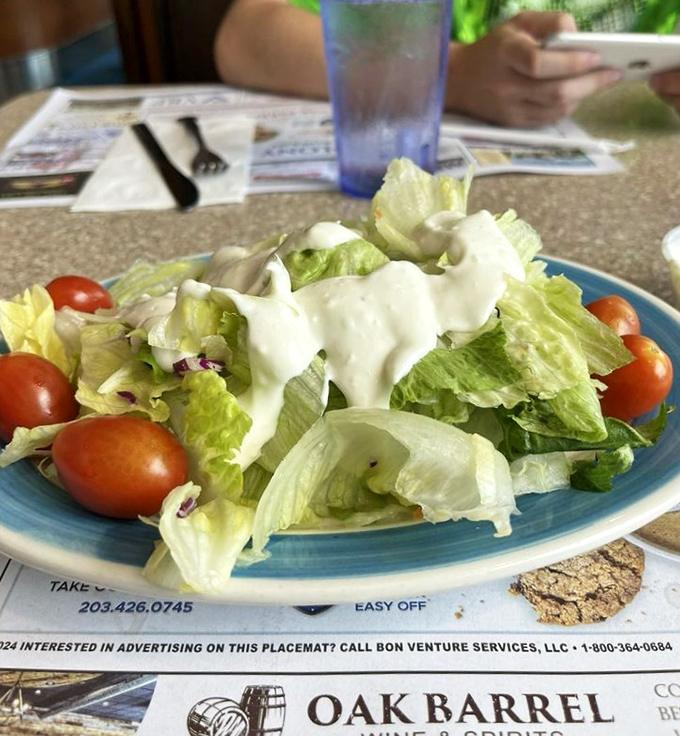 Even the garden salad gets the royal treatment&mdash;crisp greens, ripe tomatoes, and dressing applied with a generous hand that says "Yes, vegetables can be exciting."
