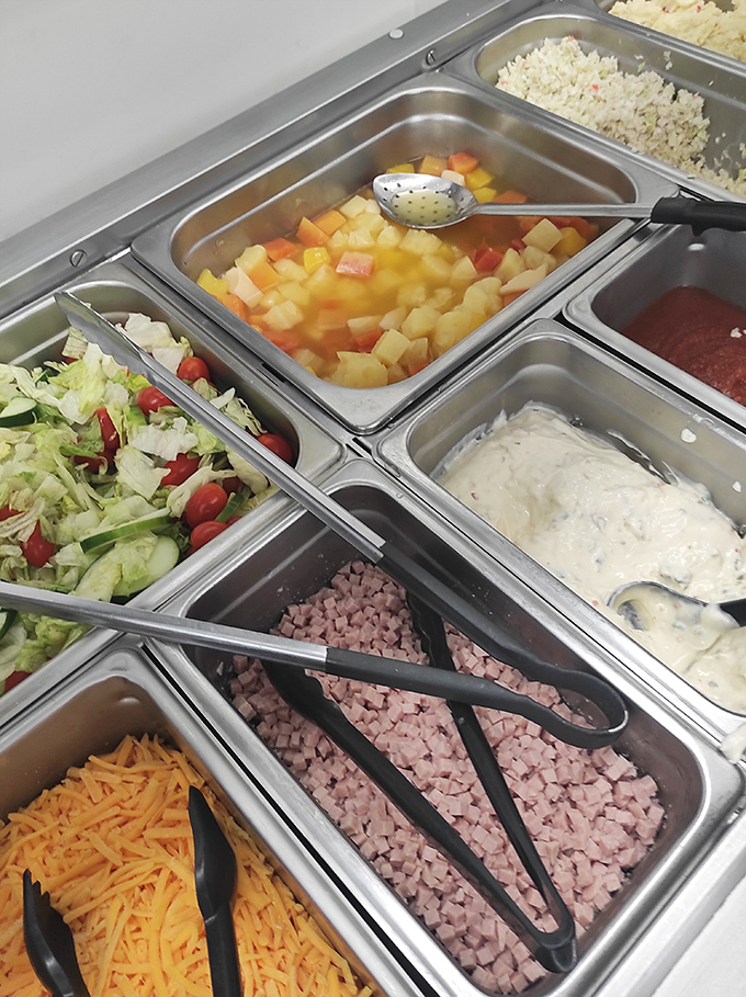 The salad bar offers fresh relief between helpings of heartier fare. That fruit salad is calling your name between barbecue adventures.