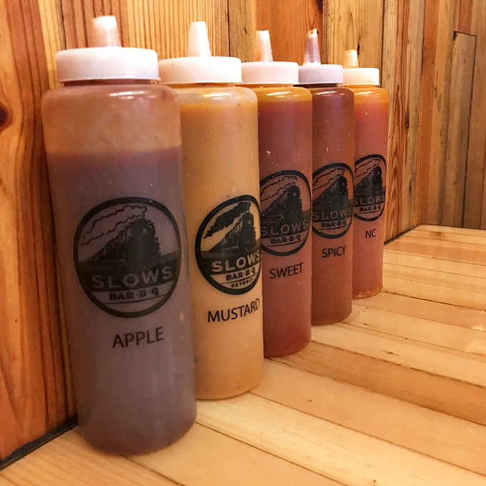 The sauce lineup—like a flavor arsenal where each bottle contains liquid magic ready to elevate your barbecue experience.