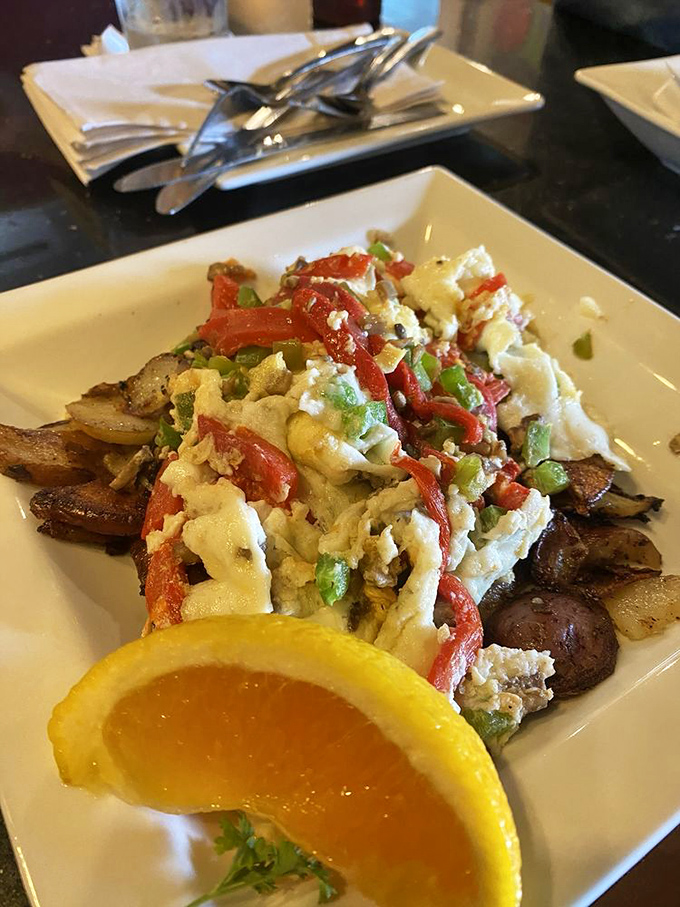 A scrambler bowl that contains all major breakfast food groups. Like someone put your favorite morning dreams on a plate.