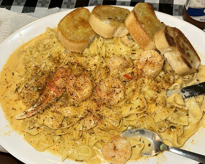 Seafood pasta that doesn't need a fancy Italian name &ndash; just plump shrimp, creamy sauce, and garlic bread for sopping up every last heavenly drop.