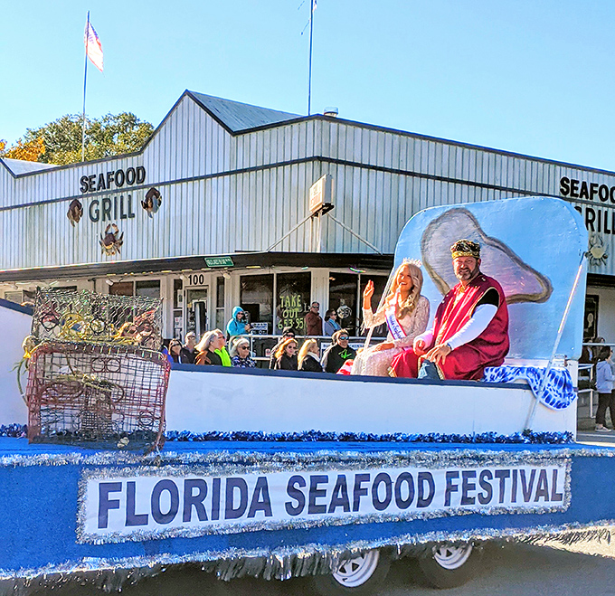 The Florida Seafood Festival float celebrates the town's maritime heritage with appropriate regality. All hail the oyster royalty!