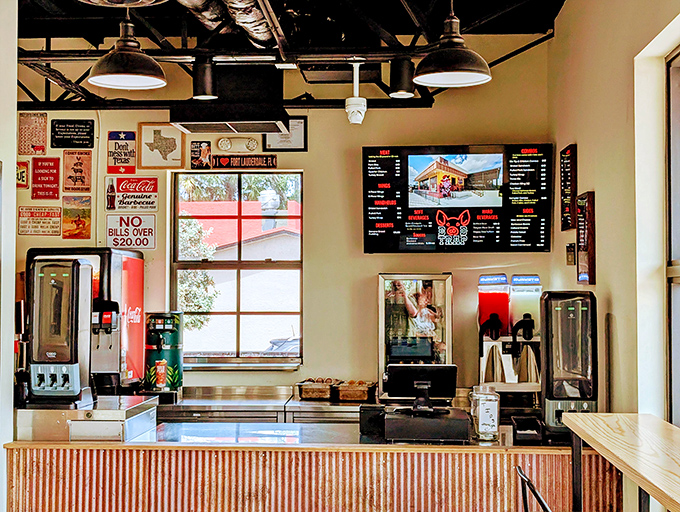 Modern efficiency meets old-school barbecue tradition. The digital menu board might be high-tech, but the flavors coming from behind that counter are timeless.