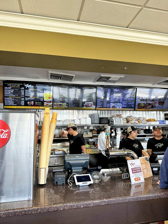 Behind this counter, breakfast magic happens with the precision of a Swiss watch and warmth of home.