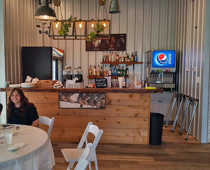 The bar area combines rustic wood with industrial touches &ndash; where craft cocktails and local brews await after you've conquered those sirloin tips.