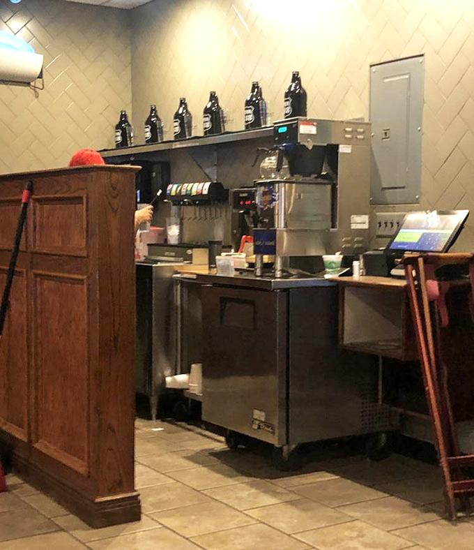 Where the magic happens—the service counter with its row of growlers standing at attention like caffeinated soldiers.
