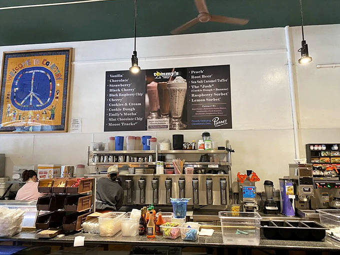 The milkshake menu board promises frozen happiness in a glass, with flavors that range from classic vanilla to adventurous combinations.