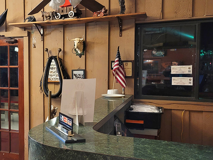 The reception area's Western-themed decor sets the stage for your carnivorous adventure. Saddle up, partner&mdash;your steak awaits.