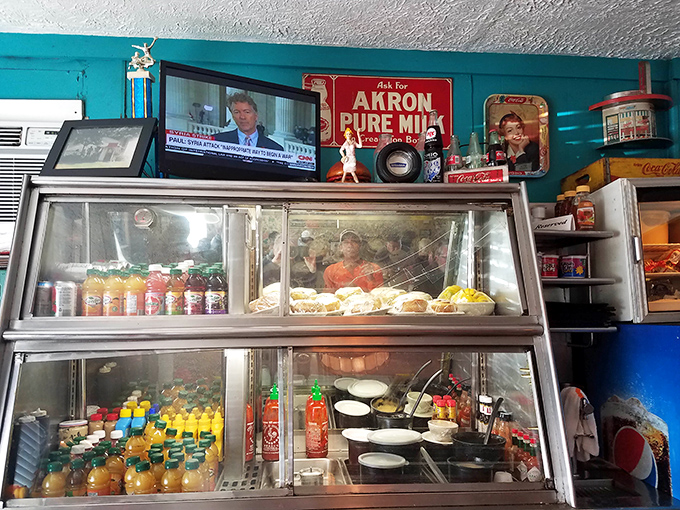 Behind this vintage display case lies a treasure trove of desserts and drinks that have been comforting Akron residents through good times and bad.
