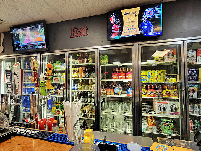 The service counter doubles as a mini-market, with the "Eat" sign serving as both instruction and life philosophy.
