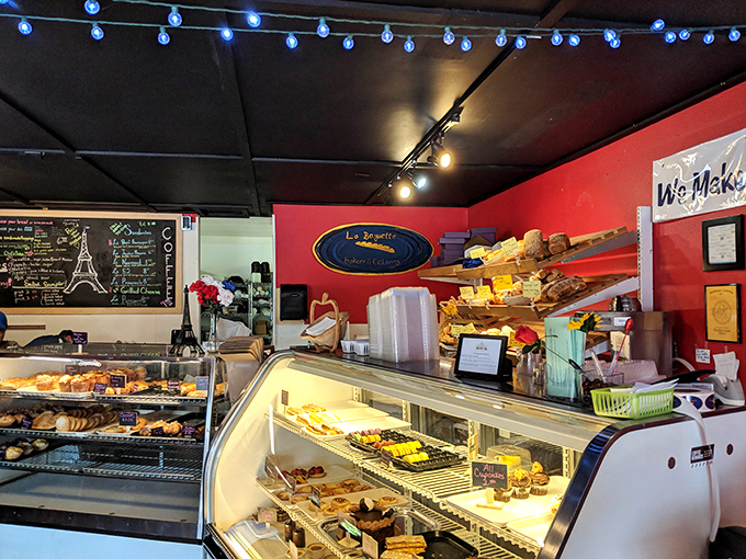 Behind this counter, magic happens daily. The display case isn't just furniture—it's a museum of edible art with rotating exhibits.