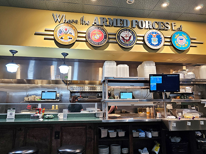 "Where the Armed Forces Eat"&mdash;a patriotic tribute above the kitchen that reminds you: heroes have good taste too.